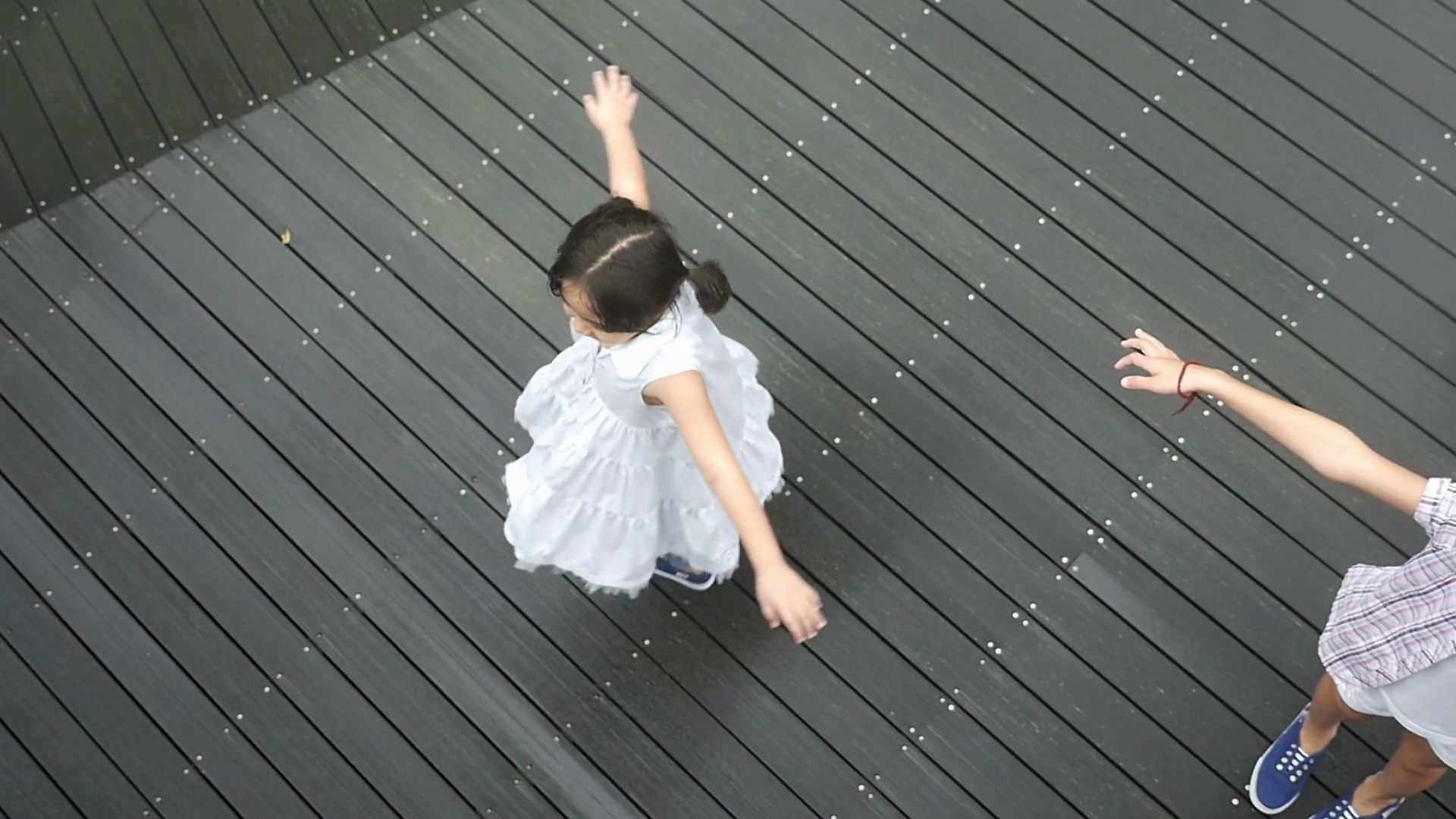 Slow motion of Asian girls spinning together on the floor Stock Video ...