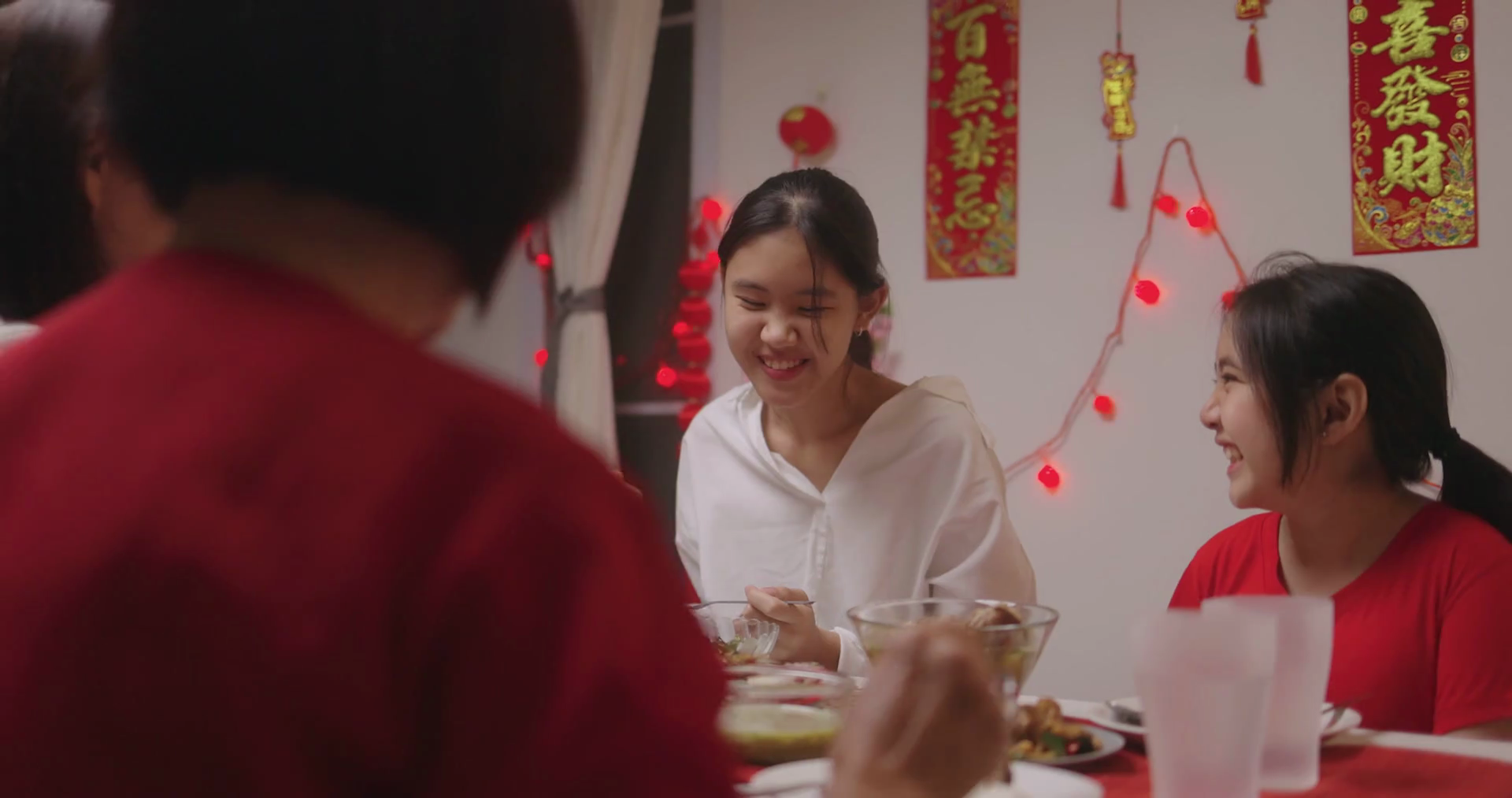 Happy Chinese Family Eating Dinner For Chinese New Year Celebrations ...