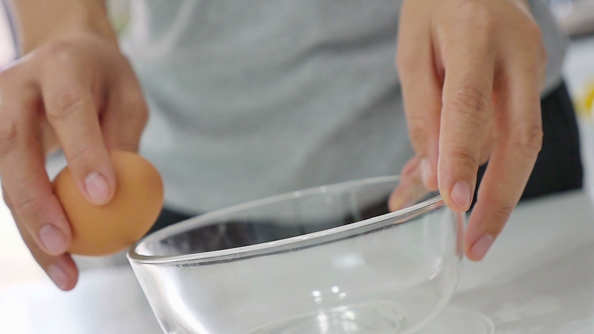 Woman Cracking Eggs In Kitchen Slow Motion Stock Footage SBV-305498962 - Storyblocks