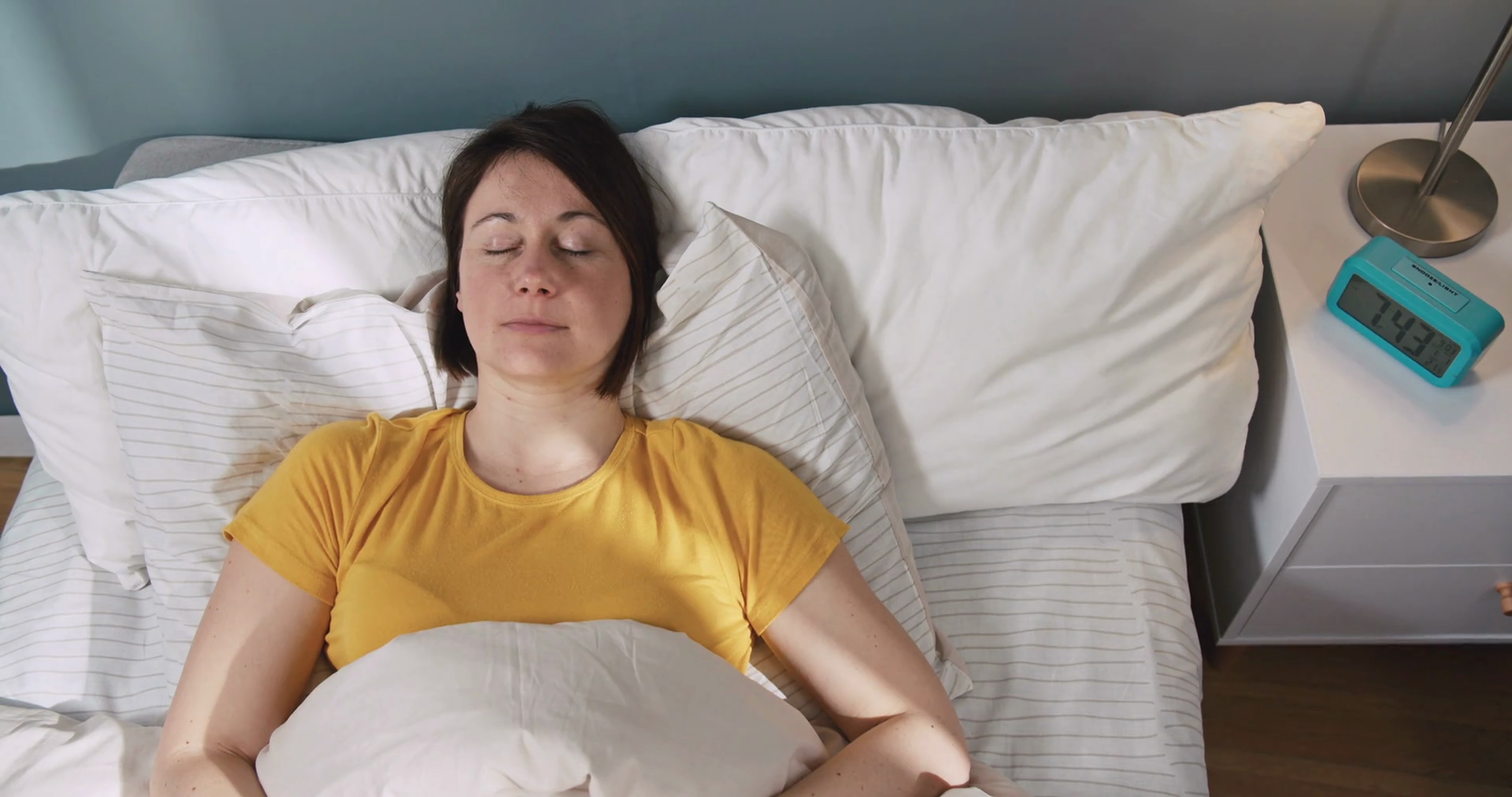 Woman Waking Up In Bed Snoozing Alarm Clock Stock Footage SBV-347742420 - Storyblocks