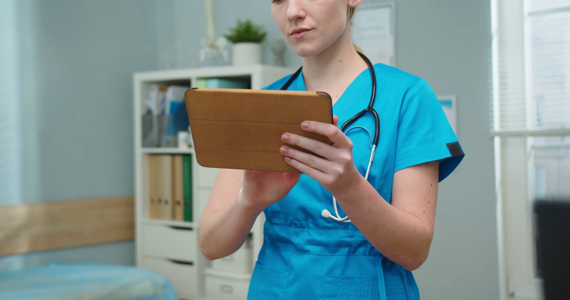 Portrait Of Female Nurse Using Tablet In Stock Footage SBV-347742075 ...