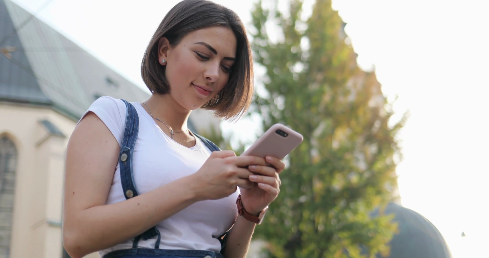 A Girl Is Happy Typing On Phone Stock Footage SBV-328862005 - Storyblocks