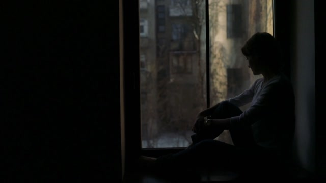 Girl Look Out Window Stock Footage: Royalty-Free Video Clips - Storyblocks