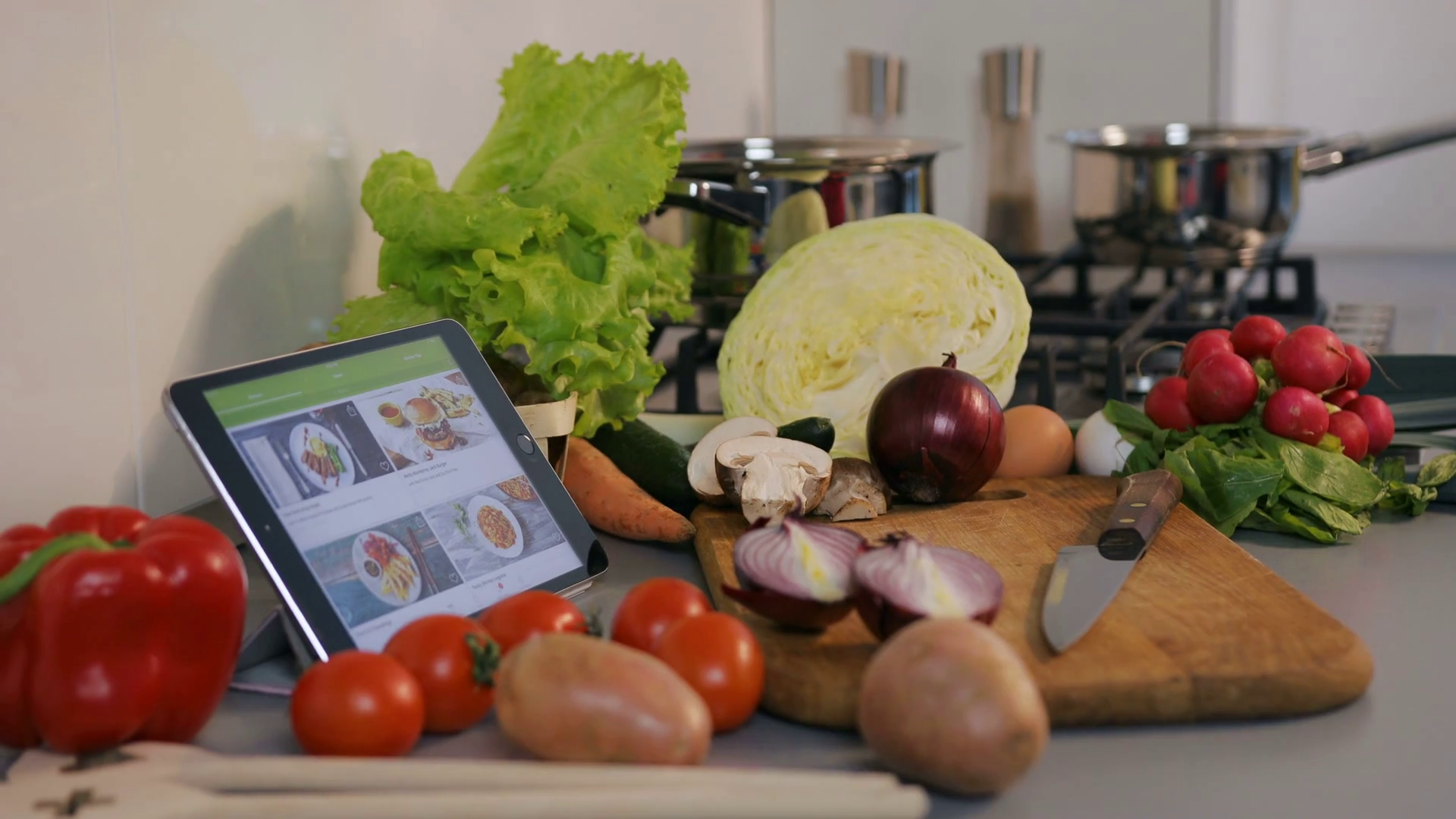 Woman Browsing Recipes On Tablet In Kitchen Stock Footage SBV-313203873 ...
