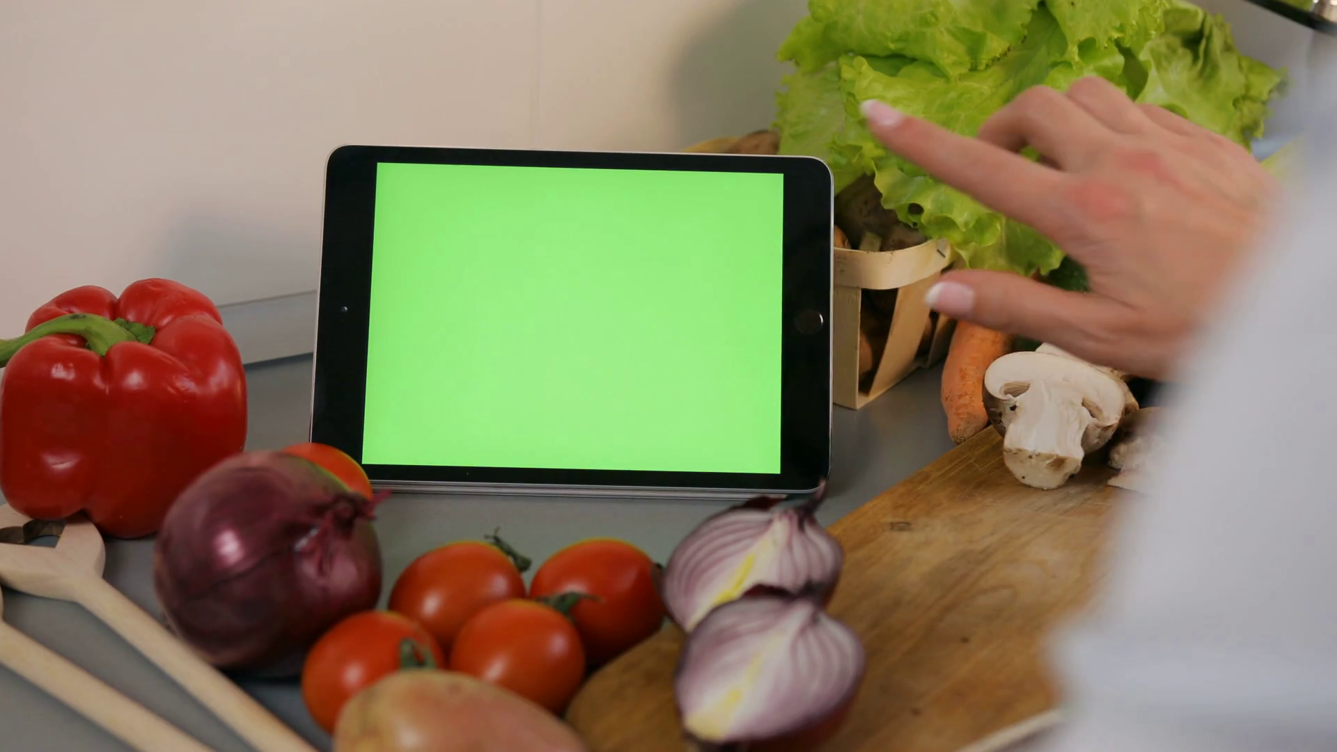 Young Woman Scrolling Through Recipes On Stock Footage SBV-313203001 ...