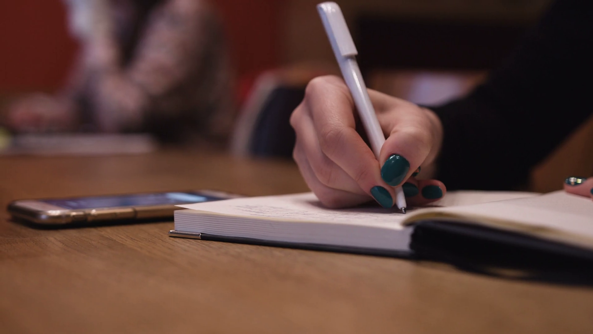 Close Up Of Woman Sitting Writing In Journal Stock Footage SBV ...