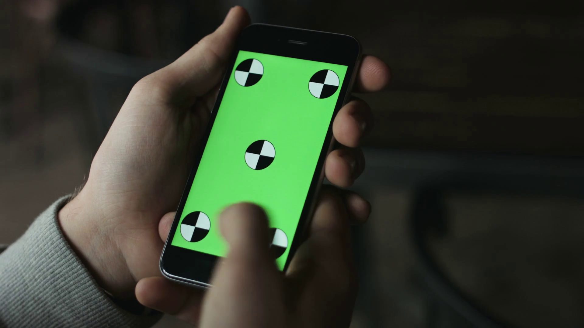 Close-up of male hands touching of smartphone. Green screen Chroma Key ...