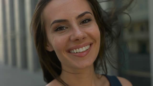 Gorgeous Woman Turning To Camera And Smiling Stock Footage: Royalty-Free Video Clips - Storyblocks