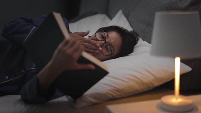 Woman Sleep Book Stock Footage: Royalty-Free Video Clips - Storyblocks