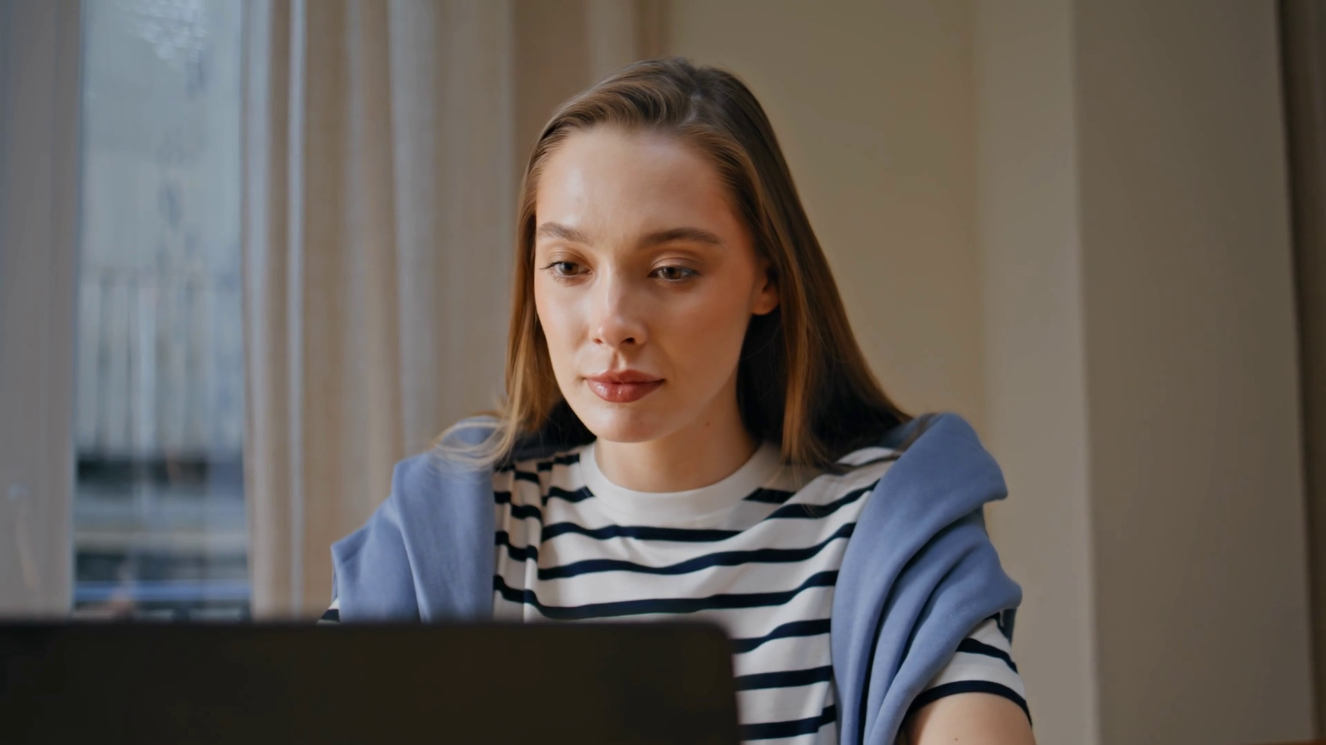 Casual Businesswoman Looking At Laptop In Stock Footage SBV-349313781 - Storyblocks