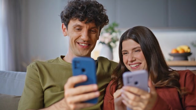 Laughing Looking Phone Stock Footage: Royalty-Free Video Clips ...