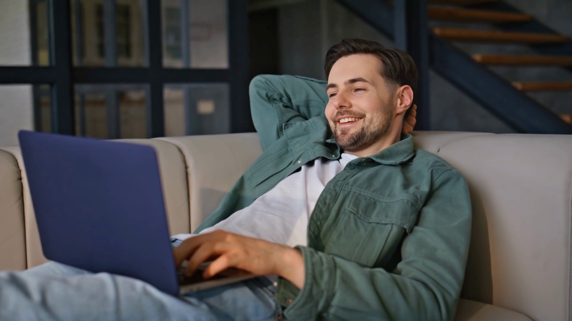 Relaxed Guy Lounging Couch Looking Laptop At Stock Footage SBV ...