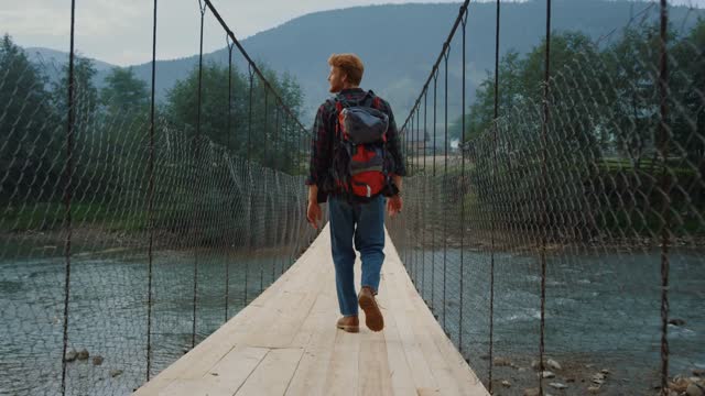 Walking Over Bridge Stock Footage: Royalty-Free Video Clips - Storyblocks
