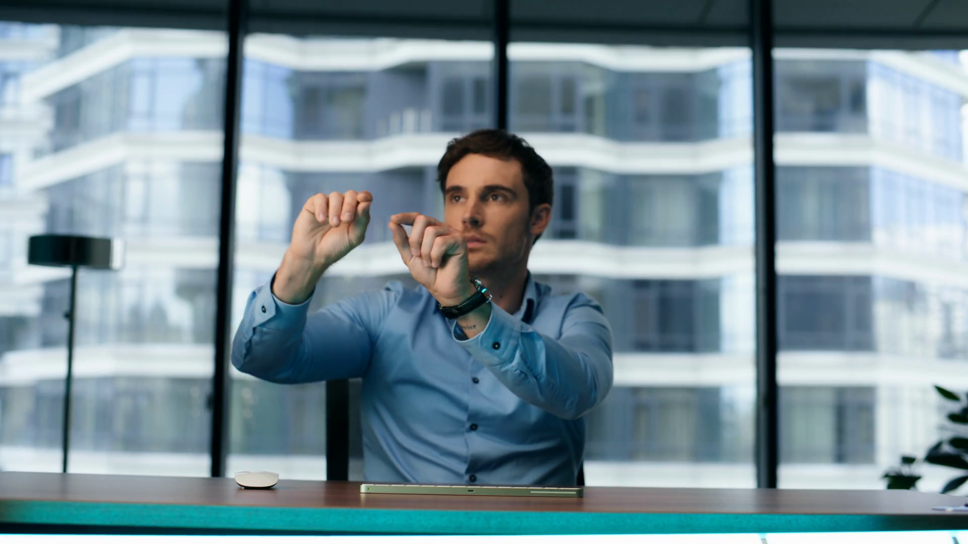 Young man professional engineer working in augmented reality at modern ...