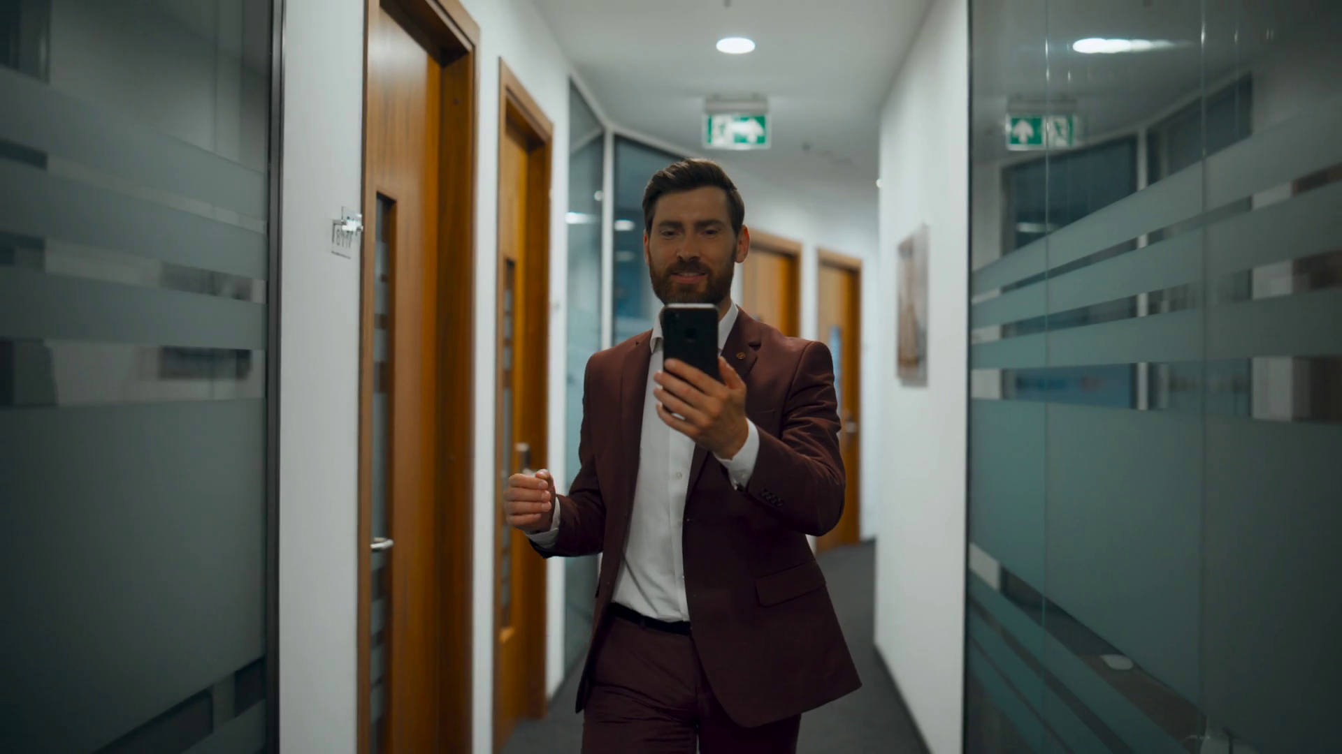 Closeup director using phone at office building. Friendly business man ...