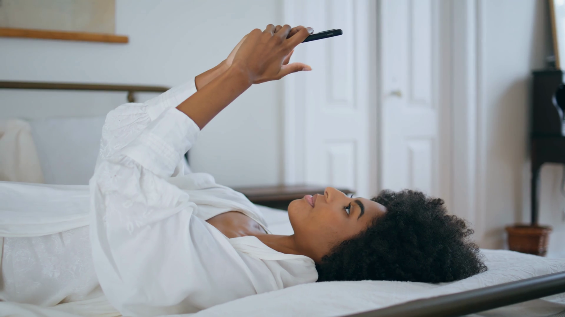 Woman Messaging On Phone On Bedroom Close Up Stock Footage SBV ...