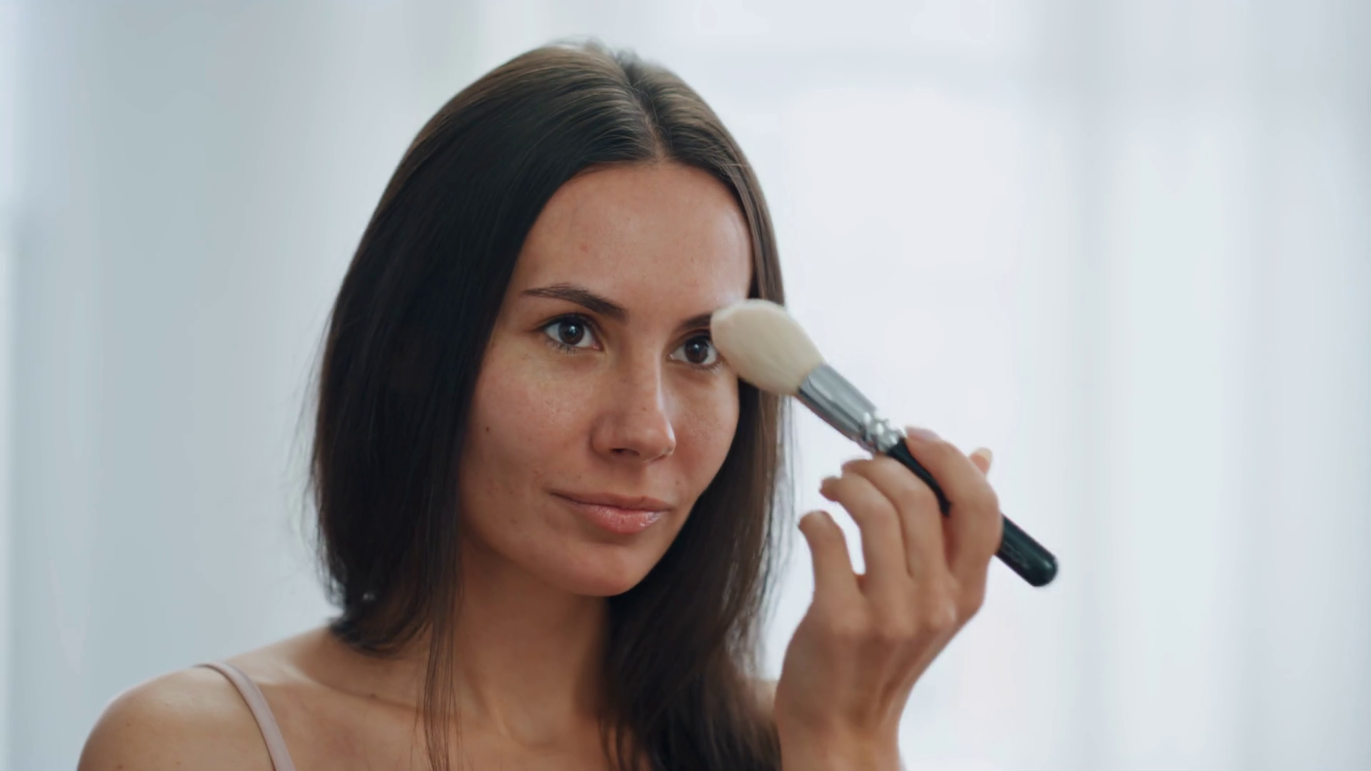 Focused Girl Powdering Face Using Brush At Stock Footage SBV-347593384 ...