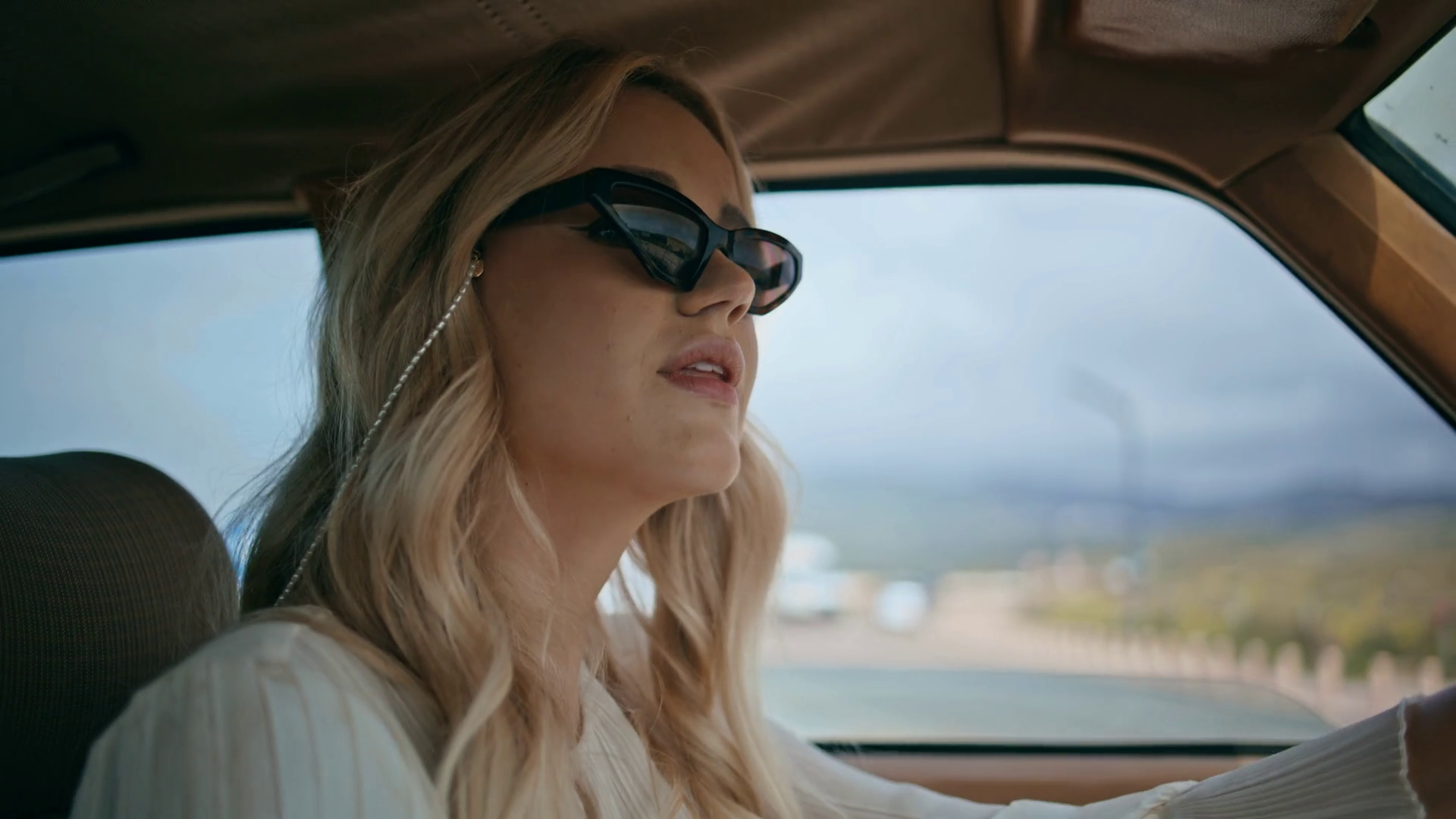 Stylish Blonde Girl Driving Road Wearing Stock Footage SBV-347639592 ...