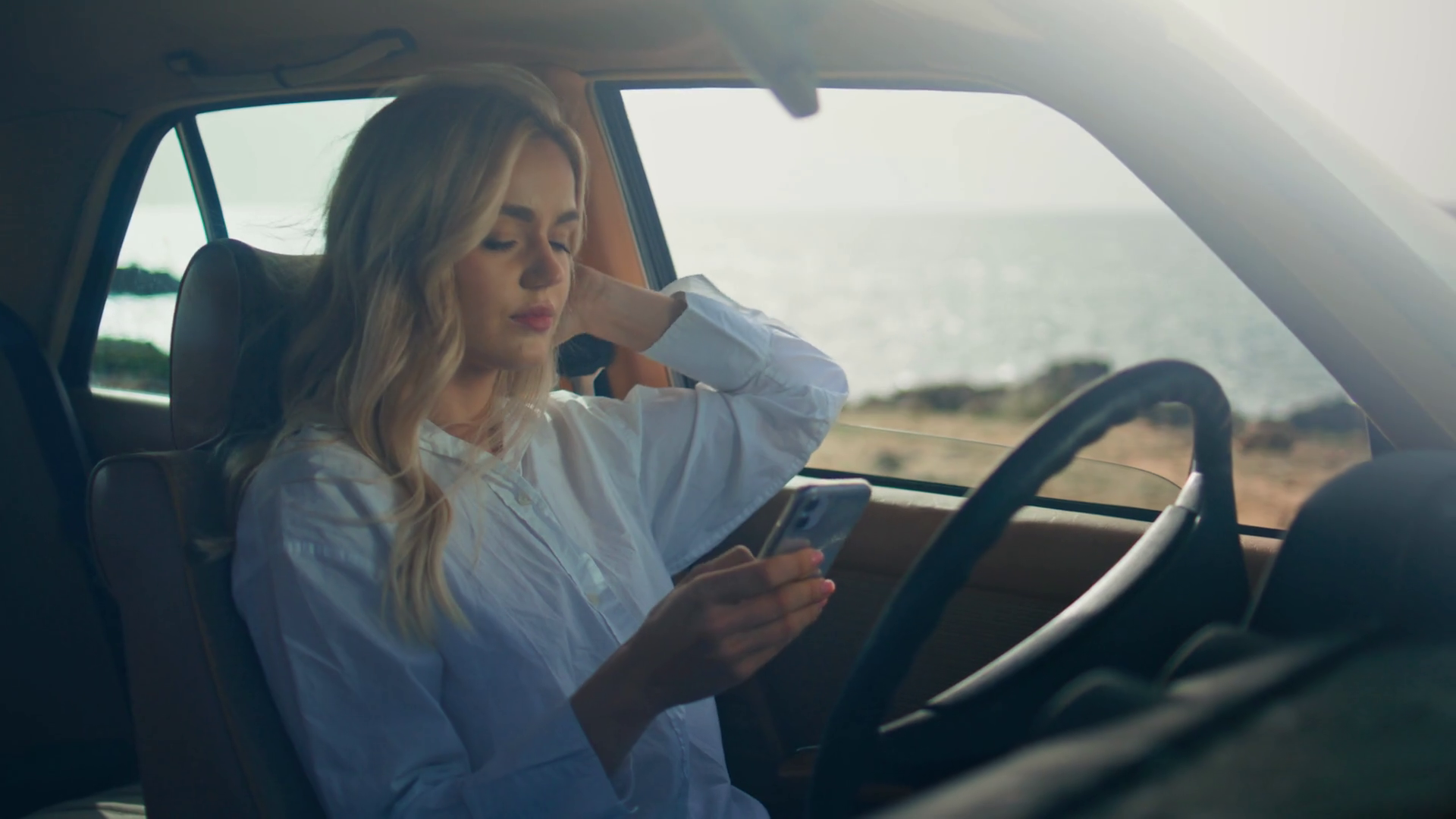 Driver Using Phone In Vintage Car Sea Stock Footage SBV-347643292 ...
