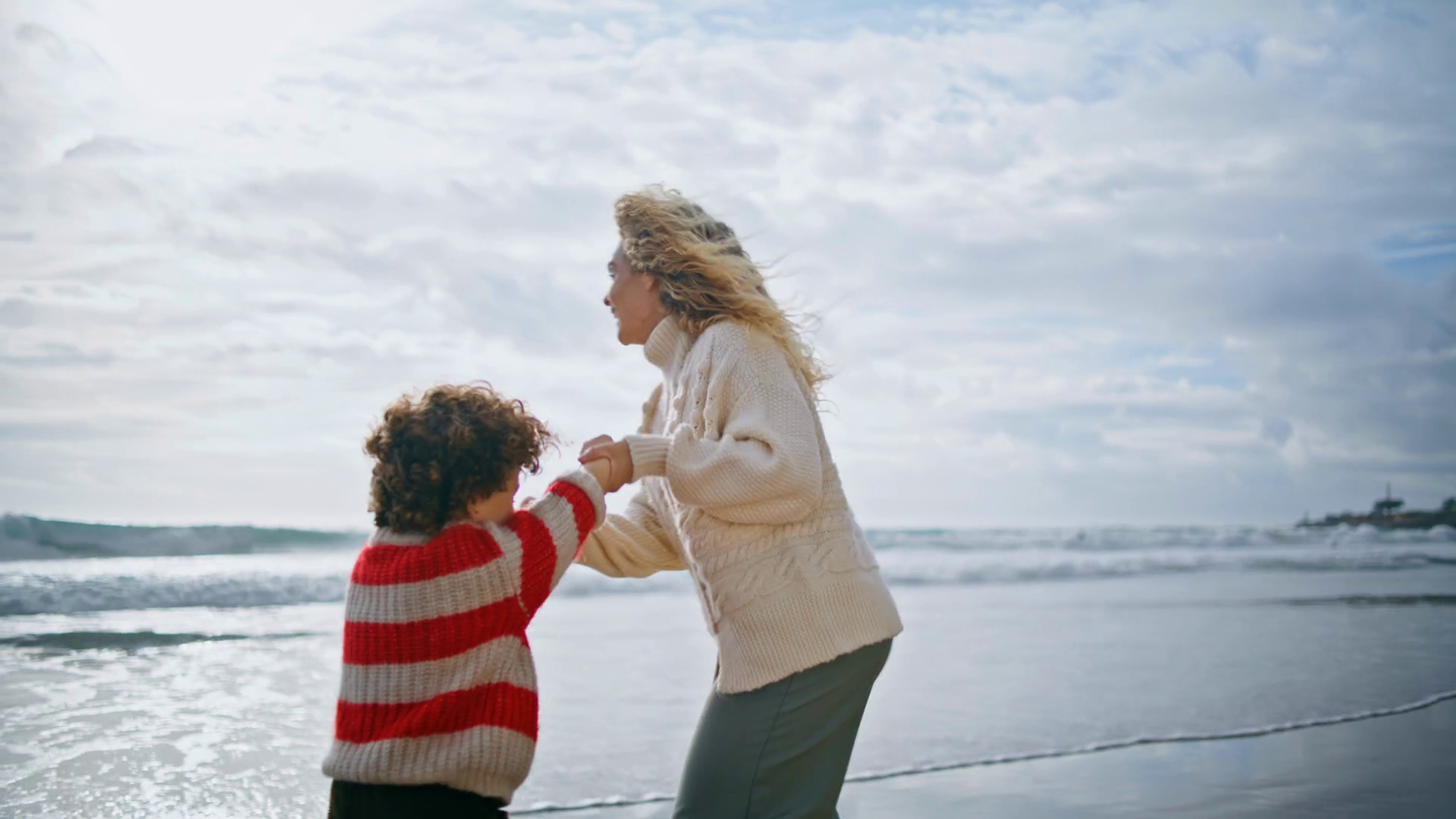 Parent Spinning Child On Beach Curly Boy Stock Footage SBV-347694747 ...