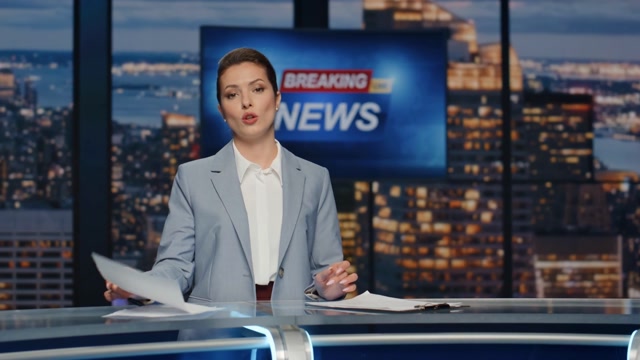 Breaking News Presenter Stock Footage: Royalty-Free Video Clips ...