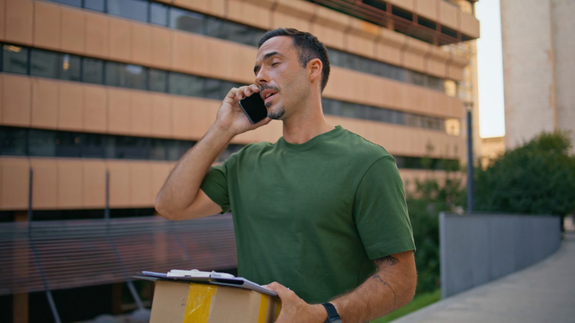 Mail Courier Talking Smartphone Delivering Stock Footage SBV-348904489 ...