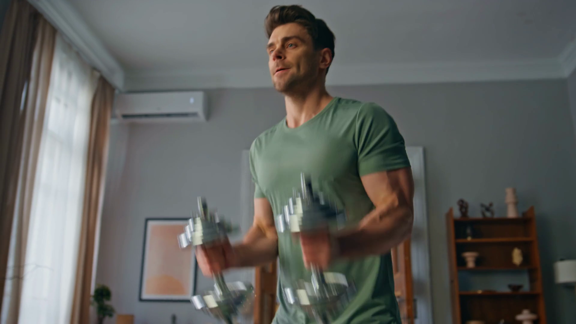 Man Pumping Arm Muscles At Home Close Up Stock Footage SBV-348957876 ...