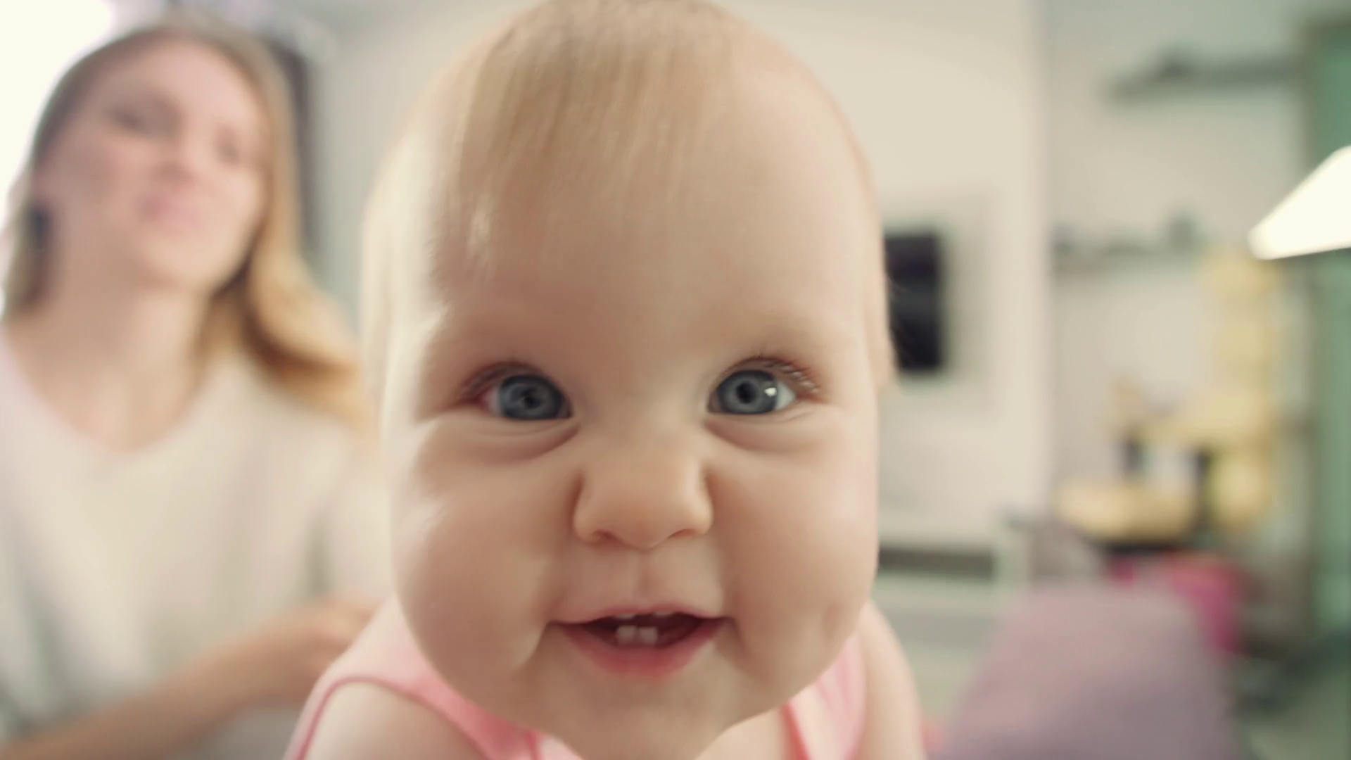 Adorable baby face looking in camera. Portrait of happy child exploring ...