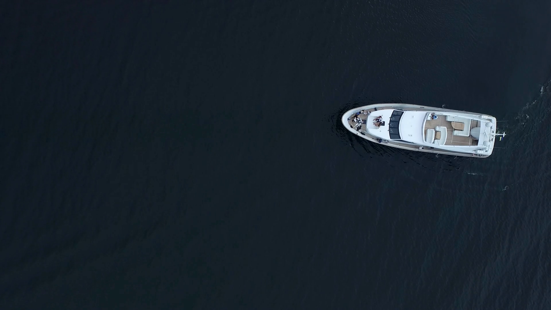 Aerial boat race. Luxury cruise trip. View from above of white boat on ...