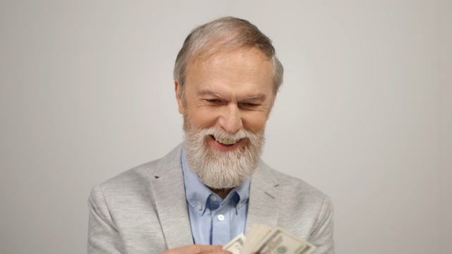 Old Man Counting Money Stock Footage: Royalty-Free Video Clips ...