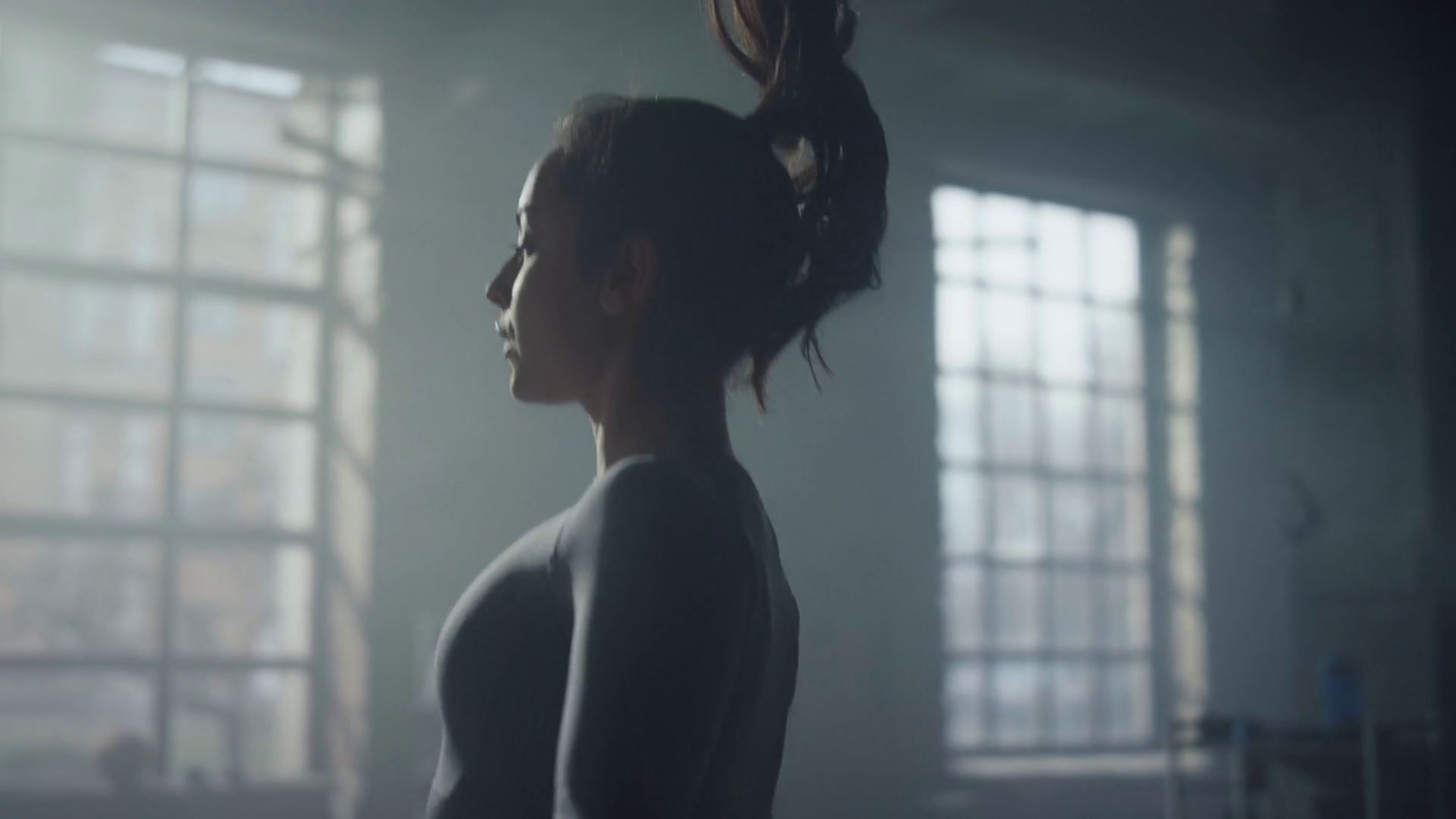 Energetic sportswoman doing cardio workout with skipping rope. Sporty ...