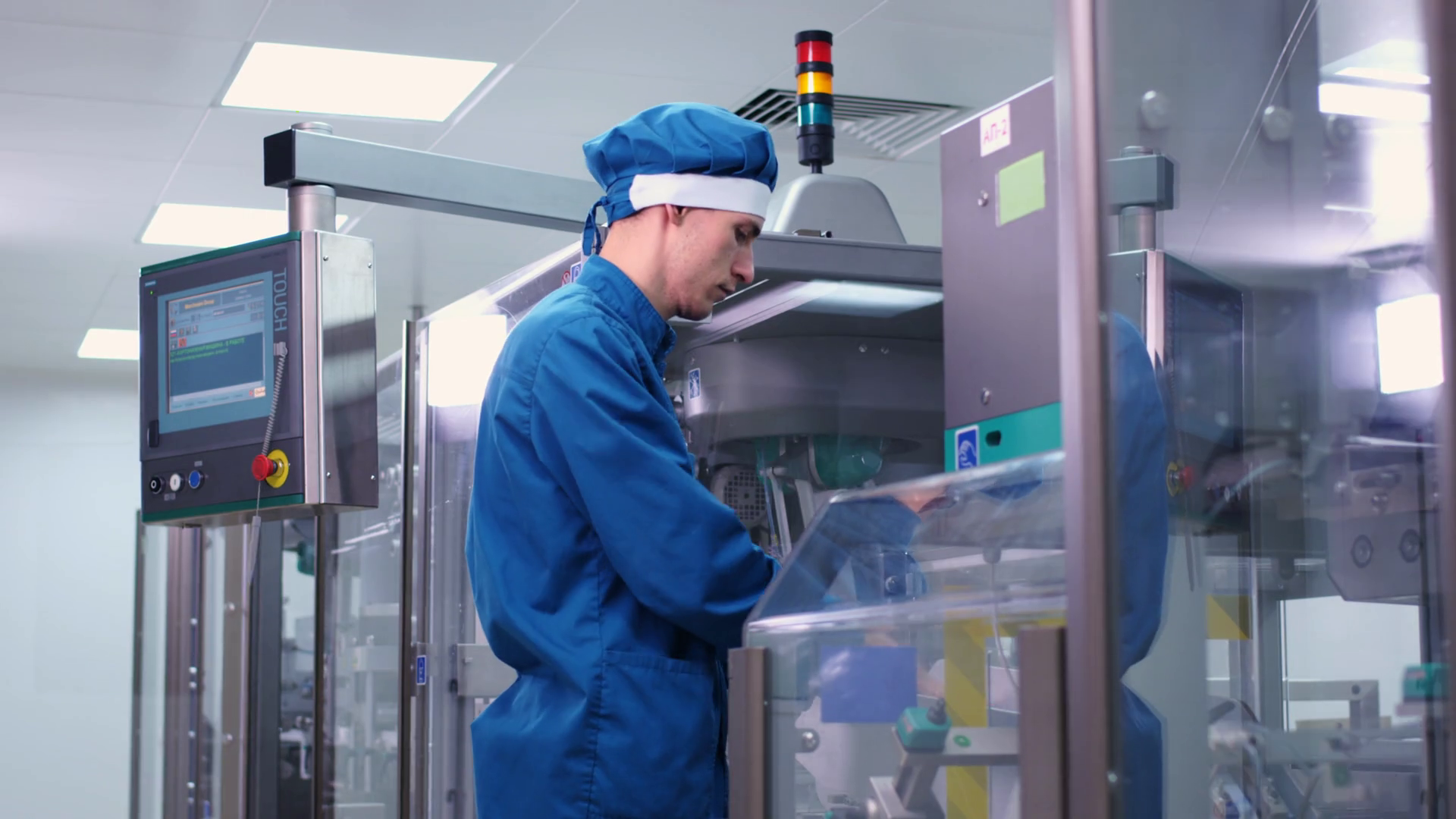 Engineer control pharmaceutical manufacturing. Factory worker operating ...