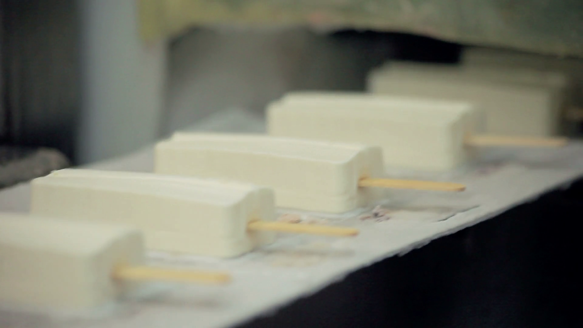 Food production line. Ice cream production line. Food factory. Close up ...