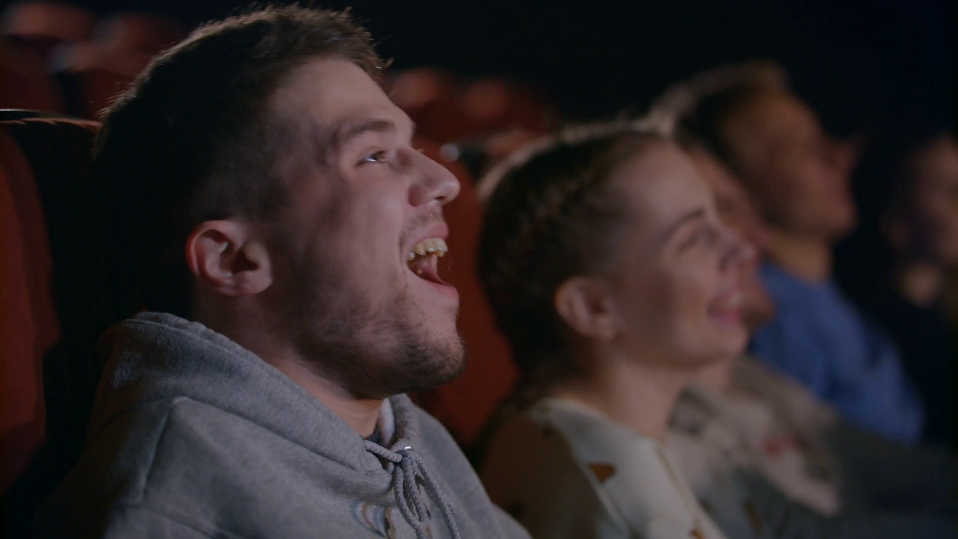 Man Laughing At Comedy Film Close Up Of Stock Footage SBV-326105634 ...