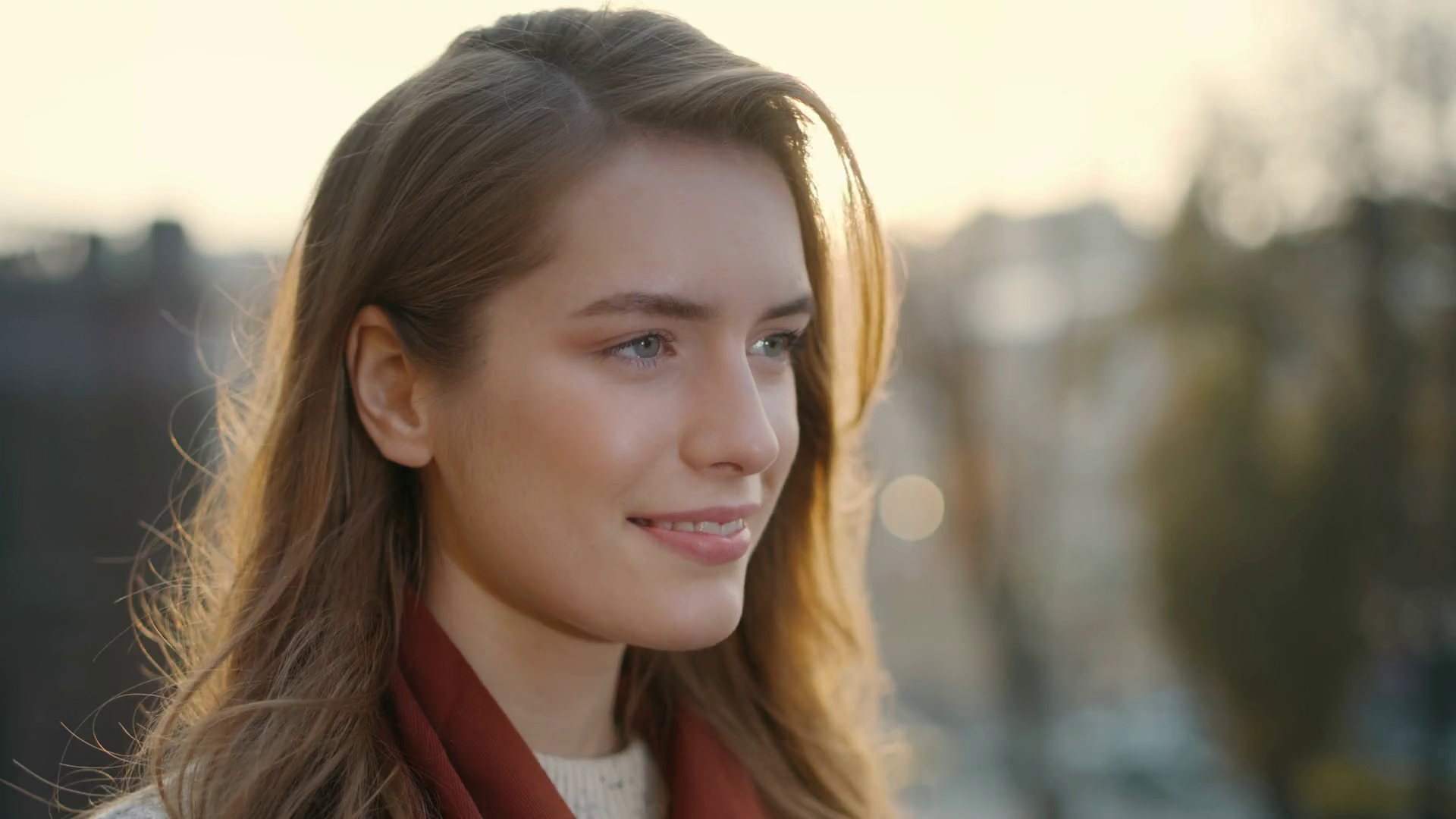 Portrait of charming woman walking on city street. Closeup pretty girl ...