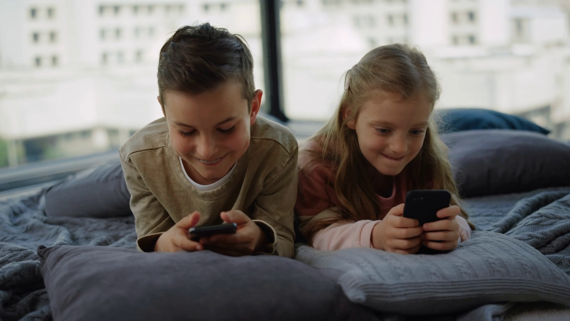 Portrait Of Satisfied Kids Playing Mobile Stock Footage SBV-338847074 ...