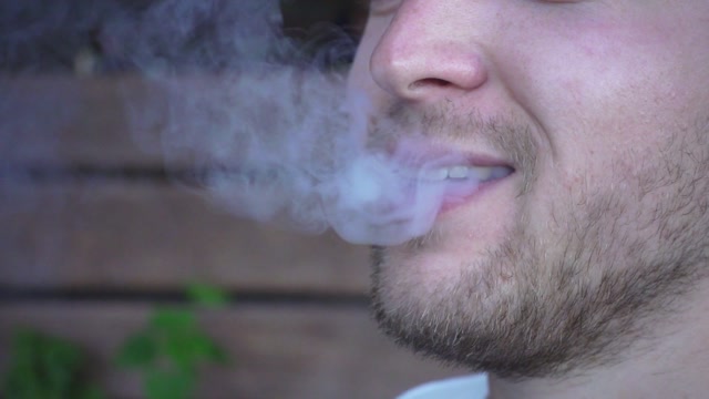 Cigarette Smoke Breathing Stock Footage: Royalty-Free Video Clips ...