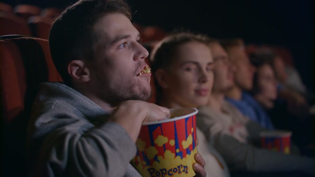 Man Eating Popcorn Stock Footage: Royalty-Free Video Clips - Storyblocks