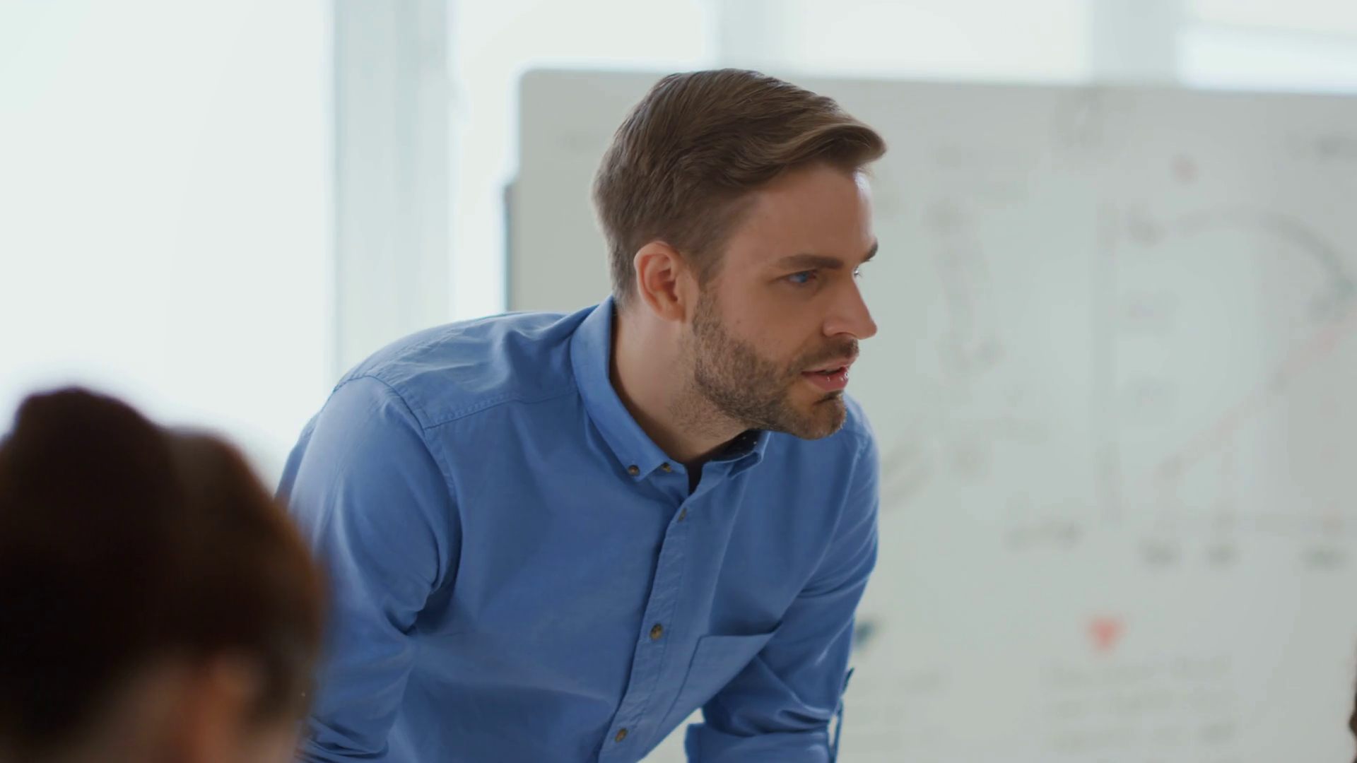 Strict businessman scolding to team in conference space. Angry team ...