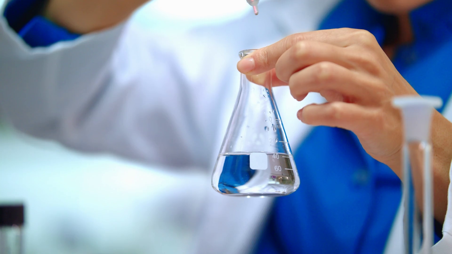 Woman Chemist Adding Chemical Reagent In Stock Footage SBV-313108353 ...