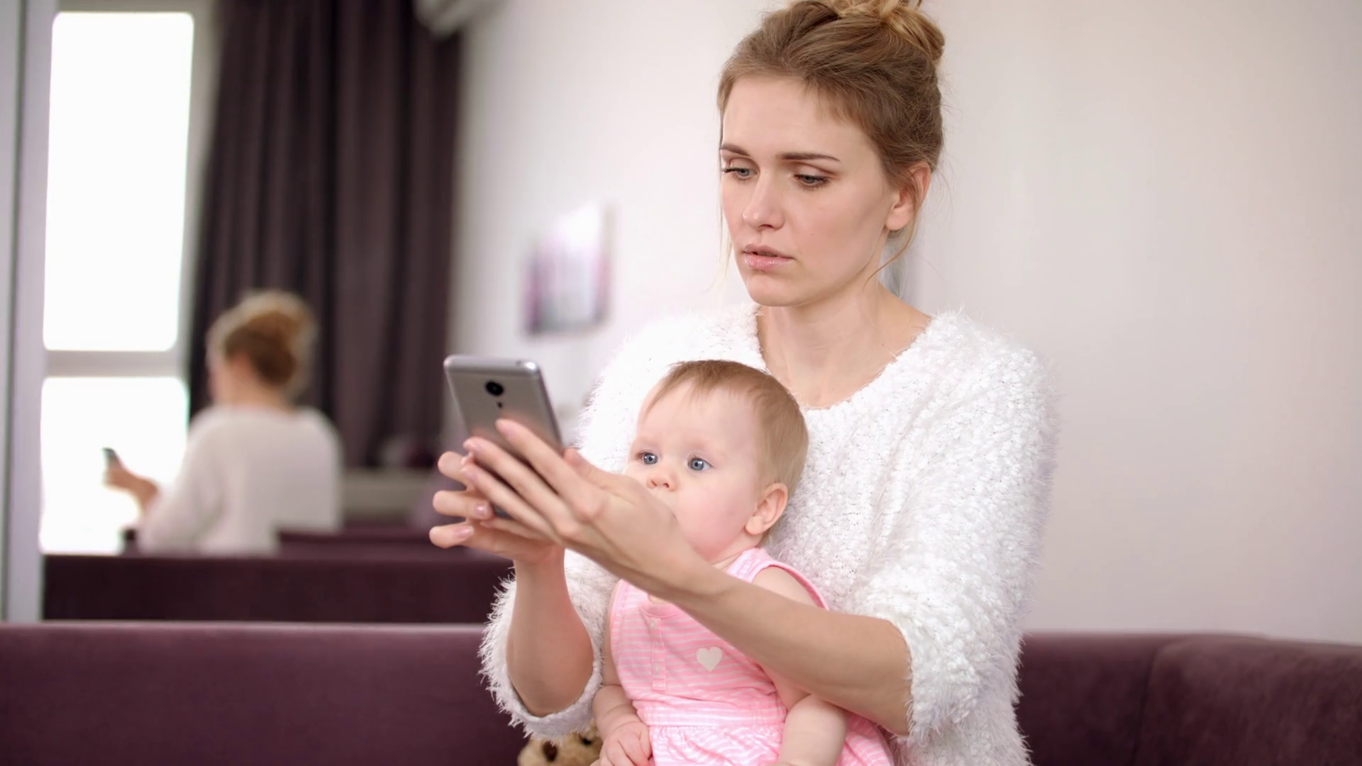 Mother With Baby Using Phone At Home Modern Stock Footage SBV-323714888 ...