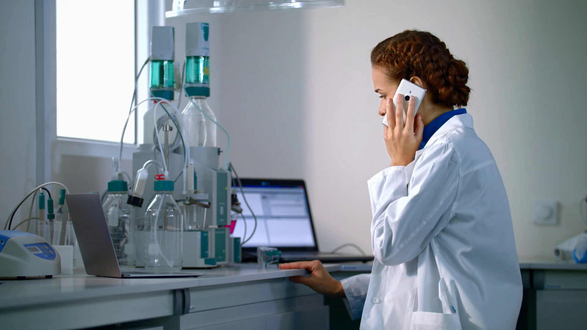 Scientist Speaking On Phone In Laboratory Stock Footage SBV-312566694 ...