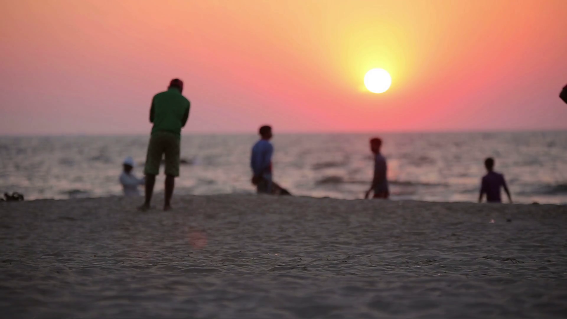 People Resting On Beach At Sunset Stock Footage SBV-311306053 - Storyblocks