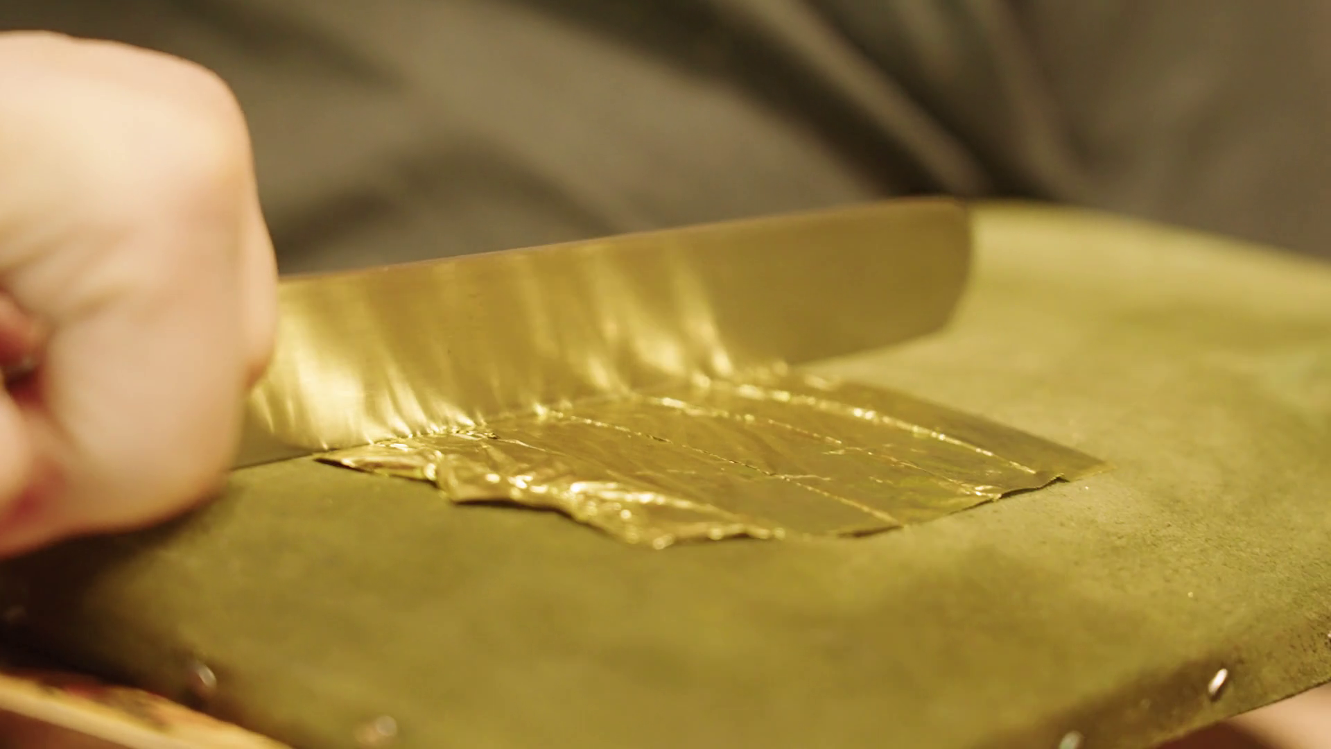 The Artist Cuts Gold Leaf Into Pieces To Stock Footage SBV-348557729 ...