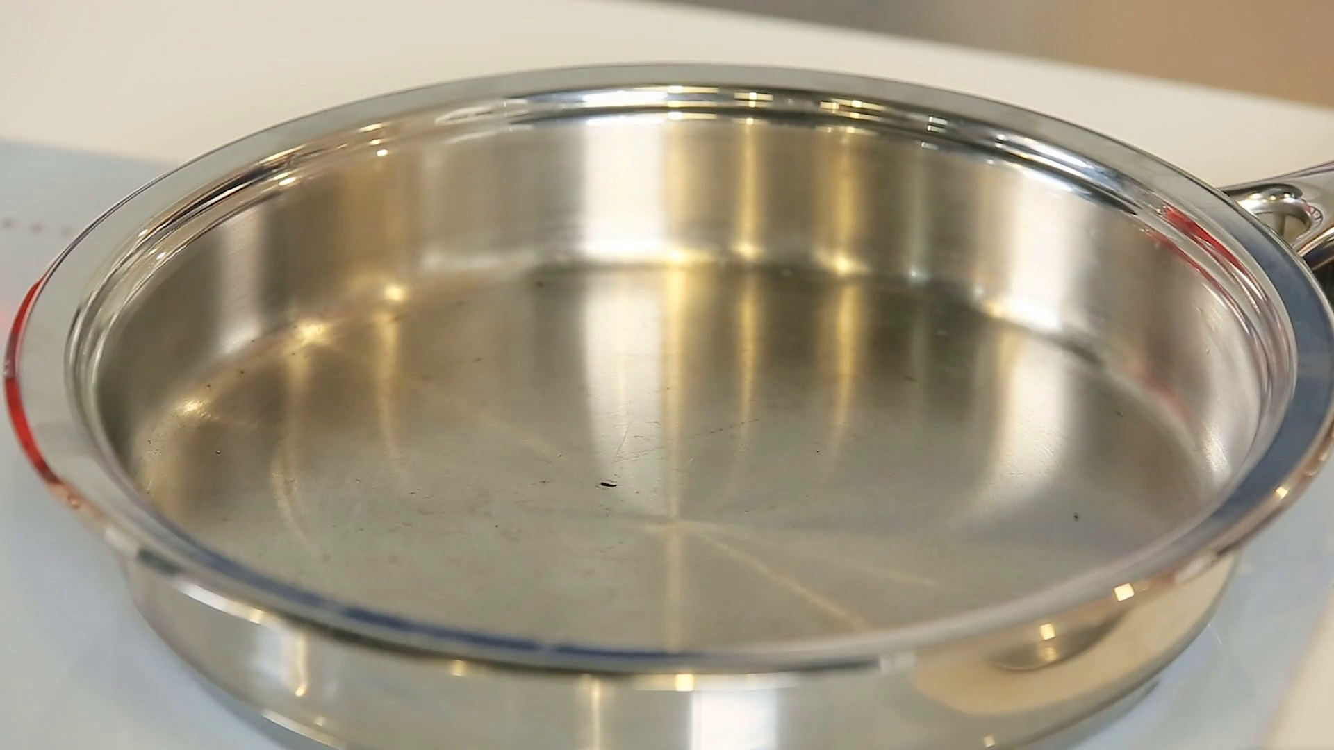 Water Dropping On Sizzling Frying Pan Stock Footage SBV-327157527 ...