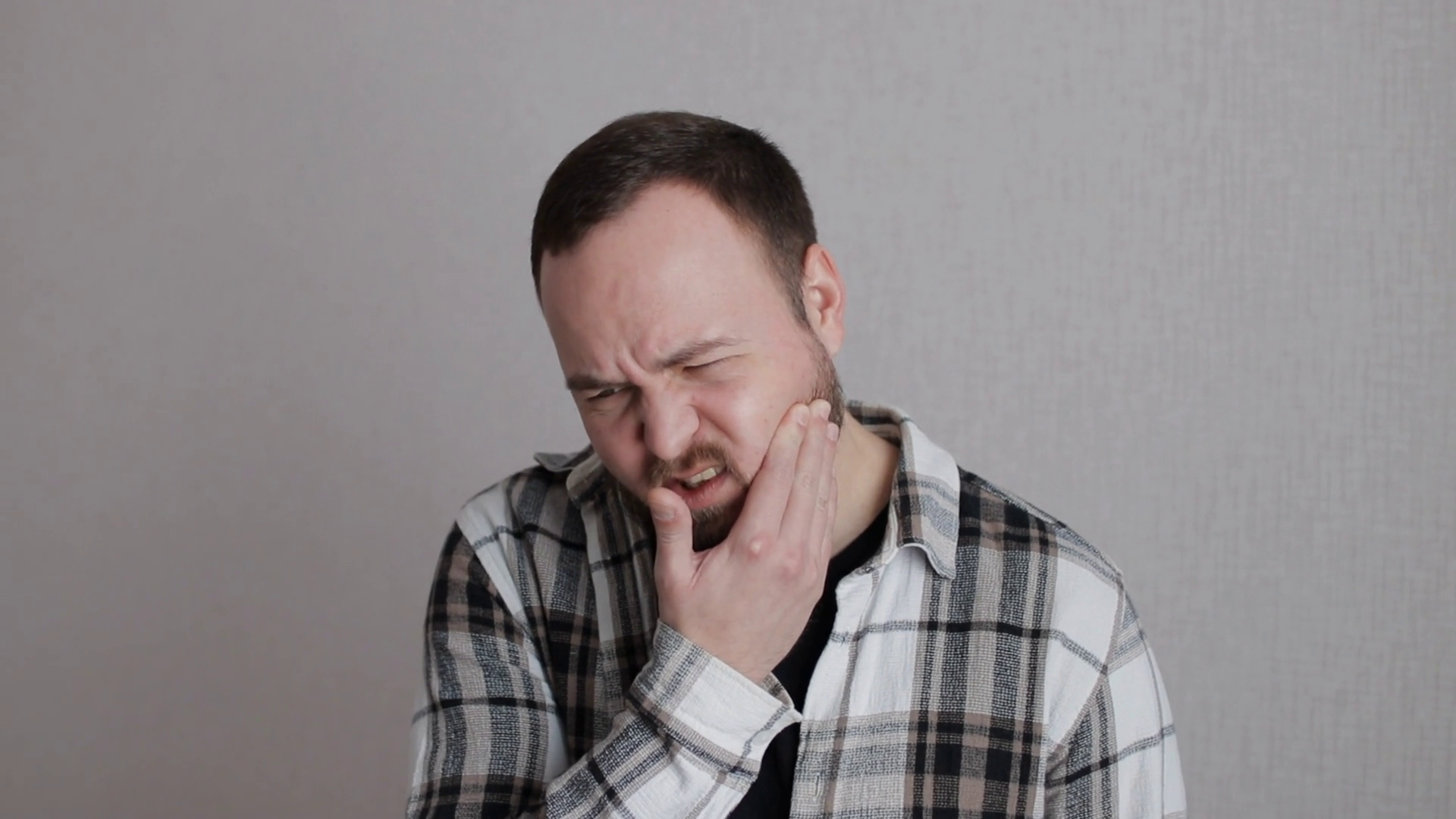 Male Clenching Jaw Grimacing From Sharp Stock Footage SBV-351754948 - Storyblocks