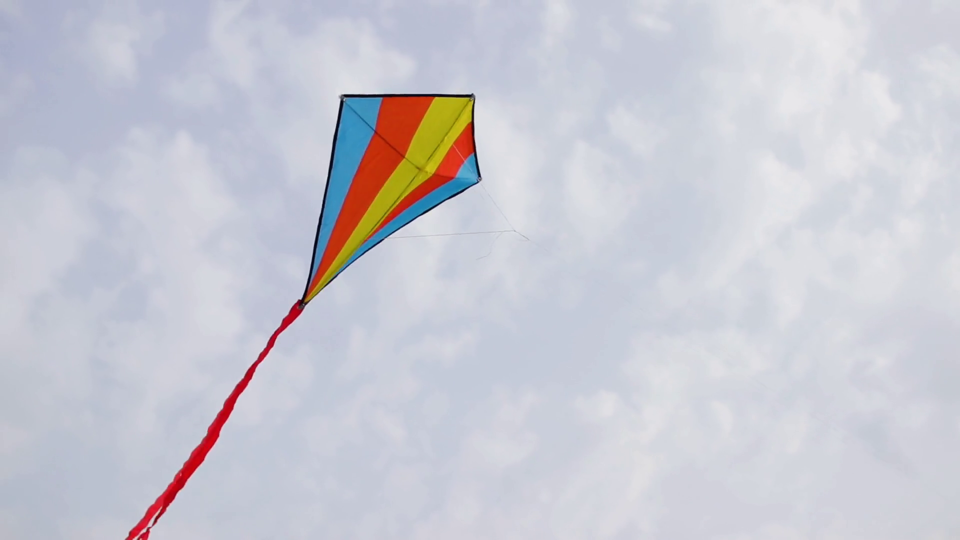 Colorful Kite Flying In Sky Under Gusts Of Stock Footage SBV-347730588 ...