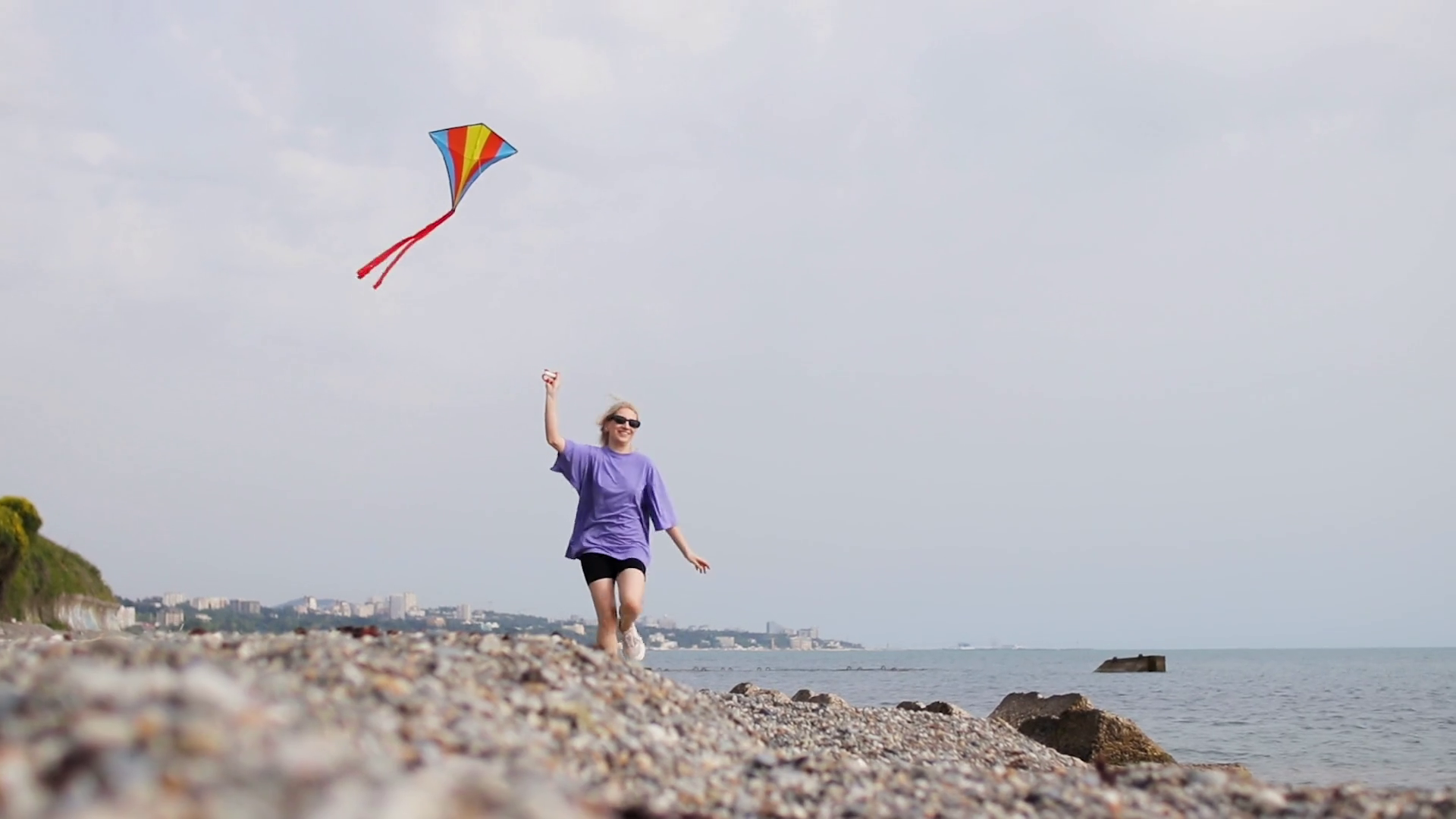 Happy Girl Running Around With Kite On Beach Stock Footage SBV ...