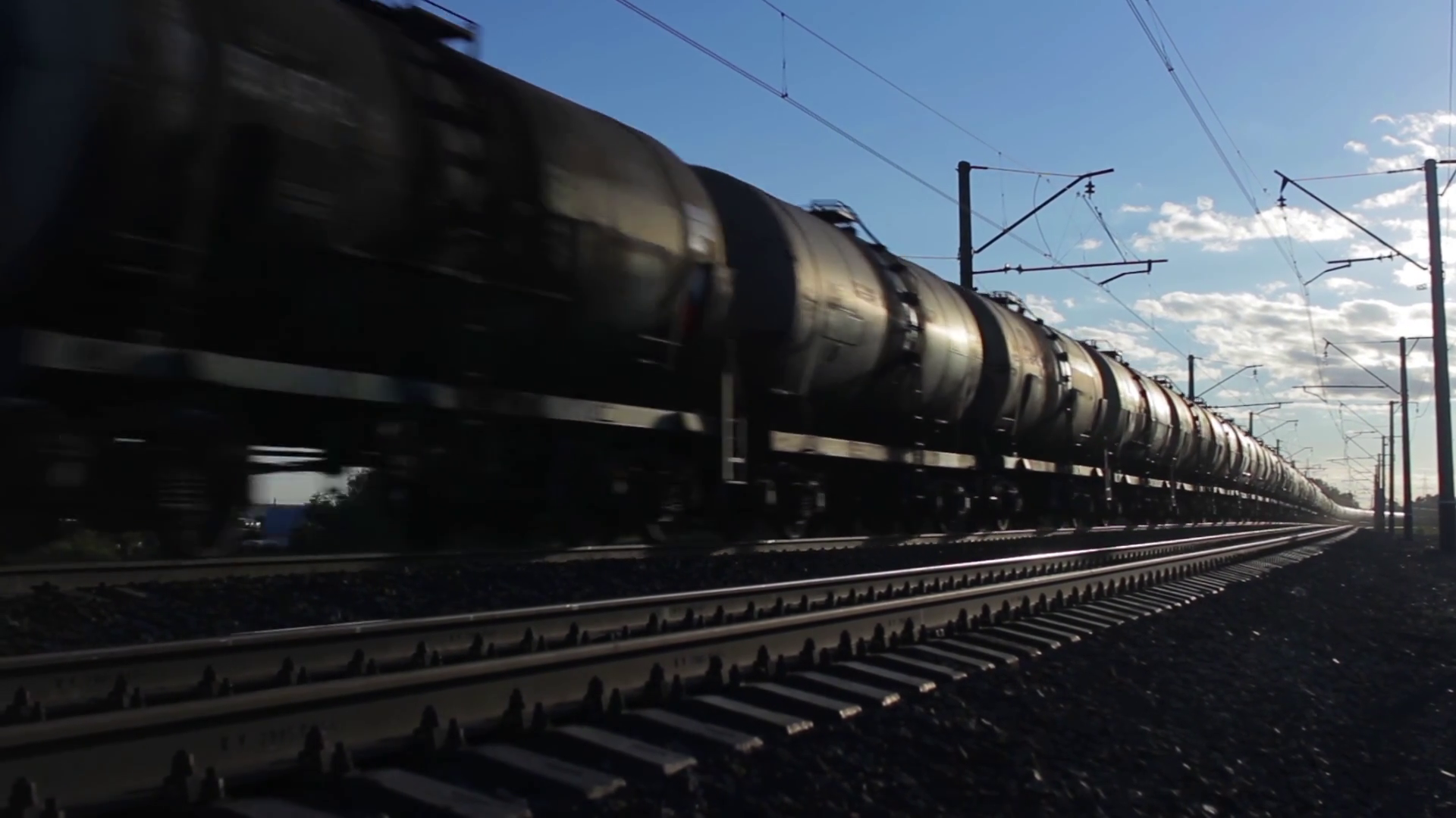 Freight Train Passing Railway At Sunset Stock Footage SBV-338594393 ...