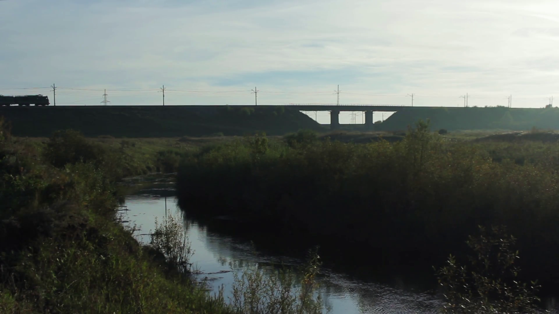 Train Crossing Railway Bridge In Distance Stock Footage SBV-338647785 ...